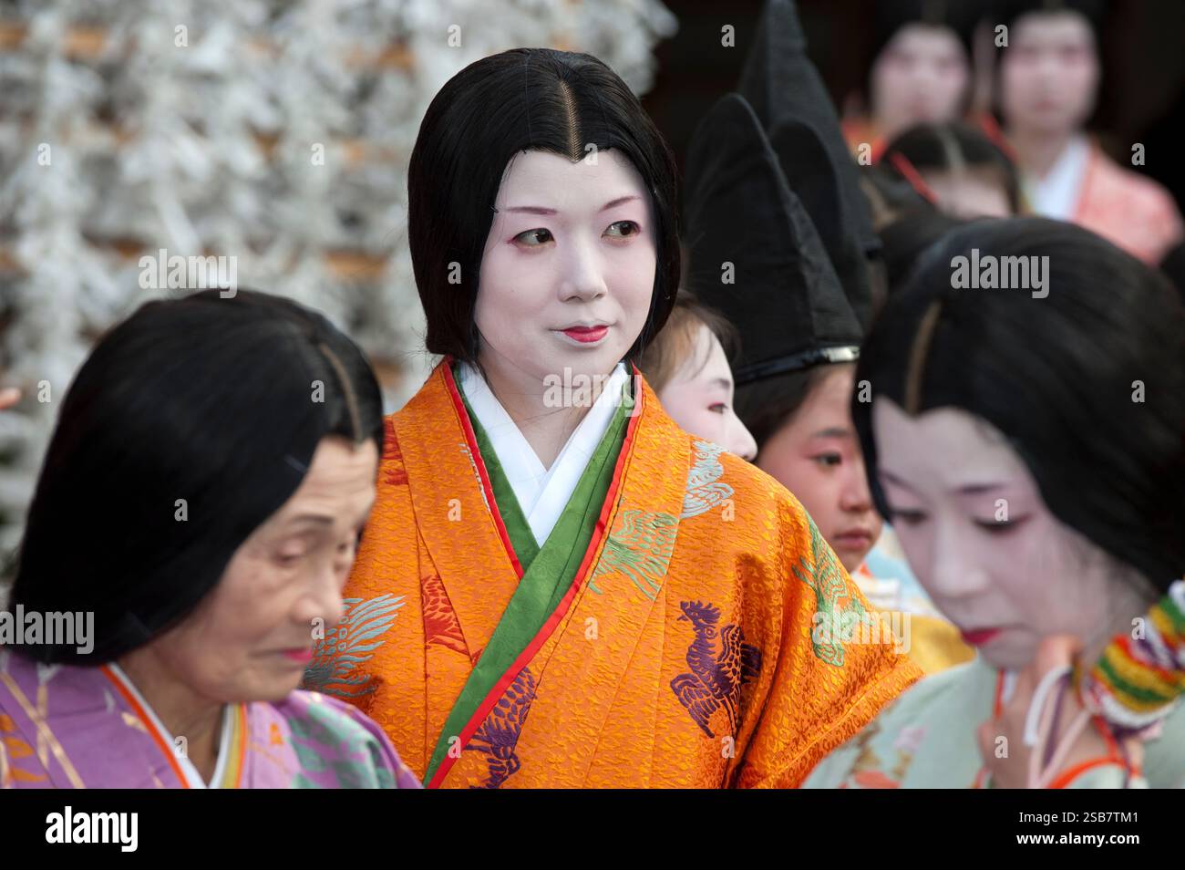 Females dressed in colorful kimono as aristocrats from the Heian Period ...