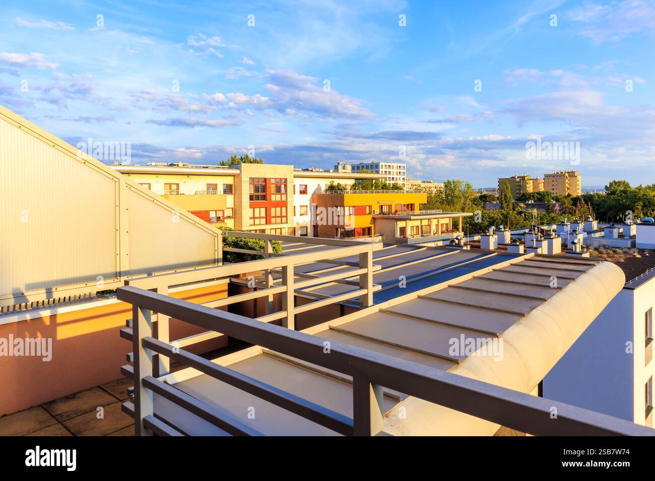 View of apartments complex from roof terrace of new flat in center of ...