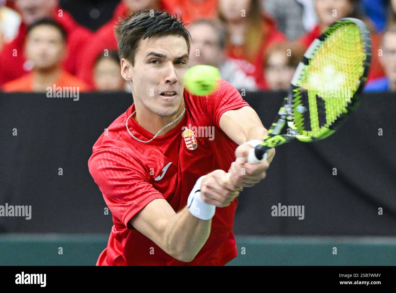 Fabian Marozsan, of Hungary, plays a shot to Alexis Galarneau, of ...