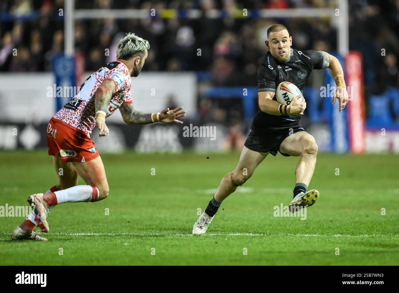 Matt Dufty of Warrington Wolves makes a break during the Toby King's ...