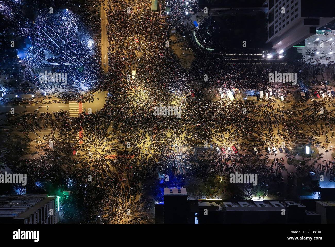 An aerial view of people blocking the Bridge of Freedom during a ...