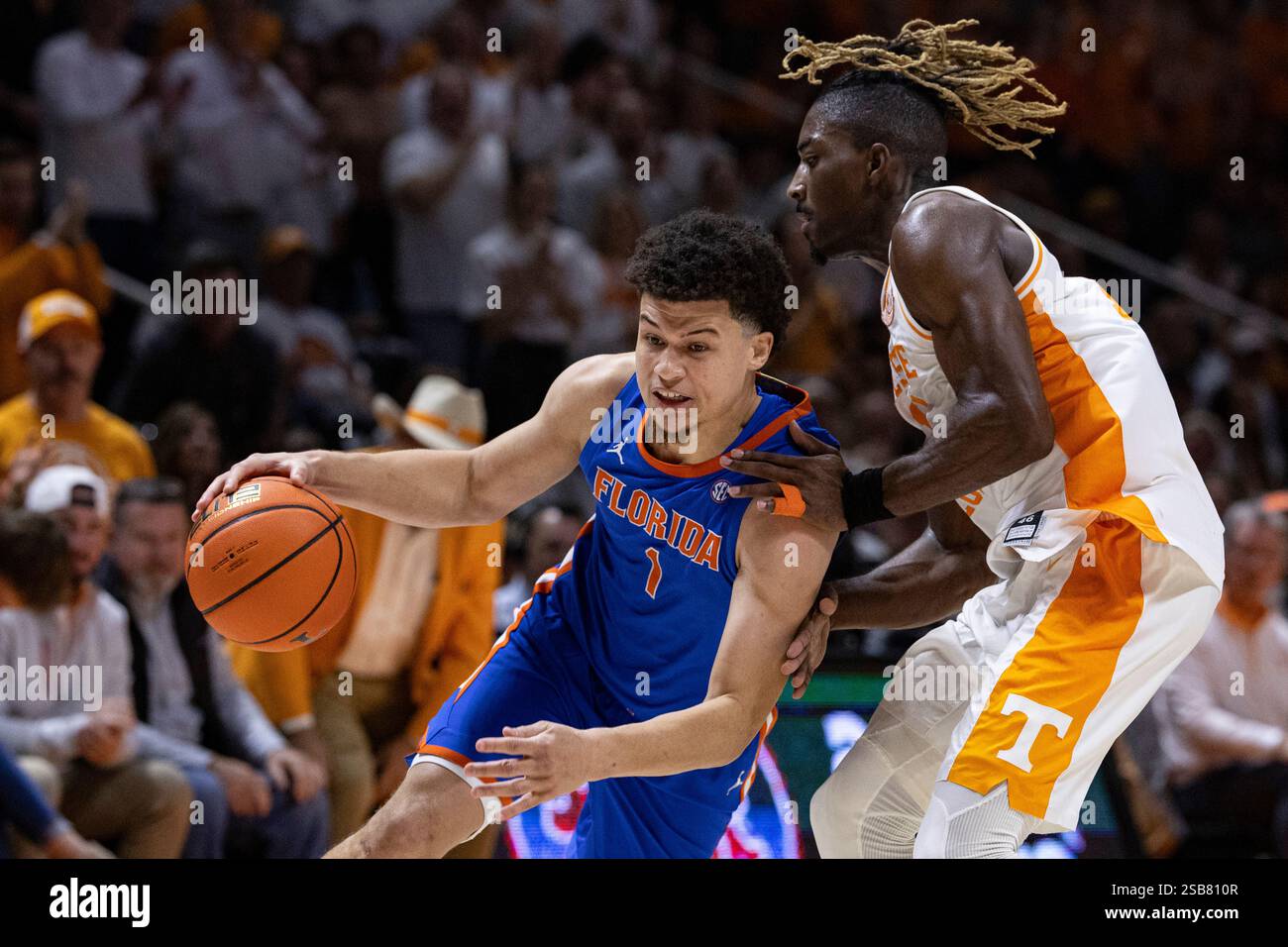 Florida guard Walter Clayton Jr. (1) drives against Tennessee guard ...