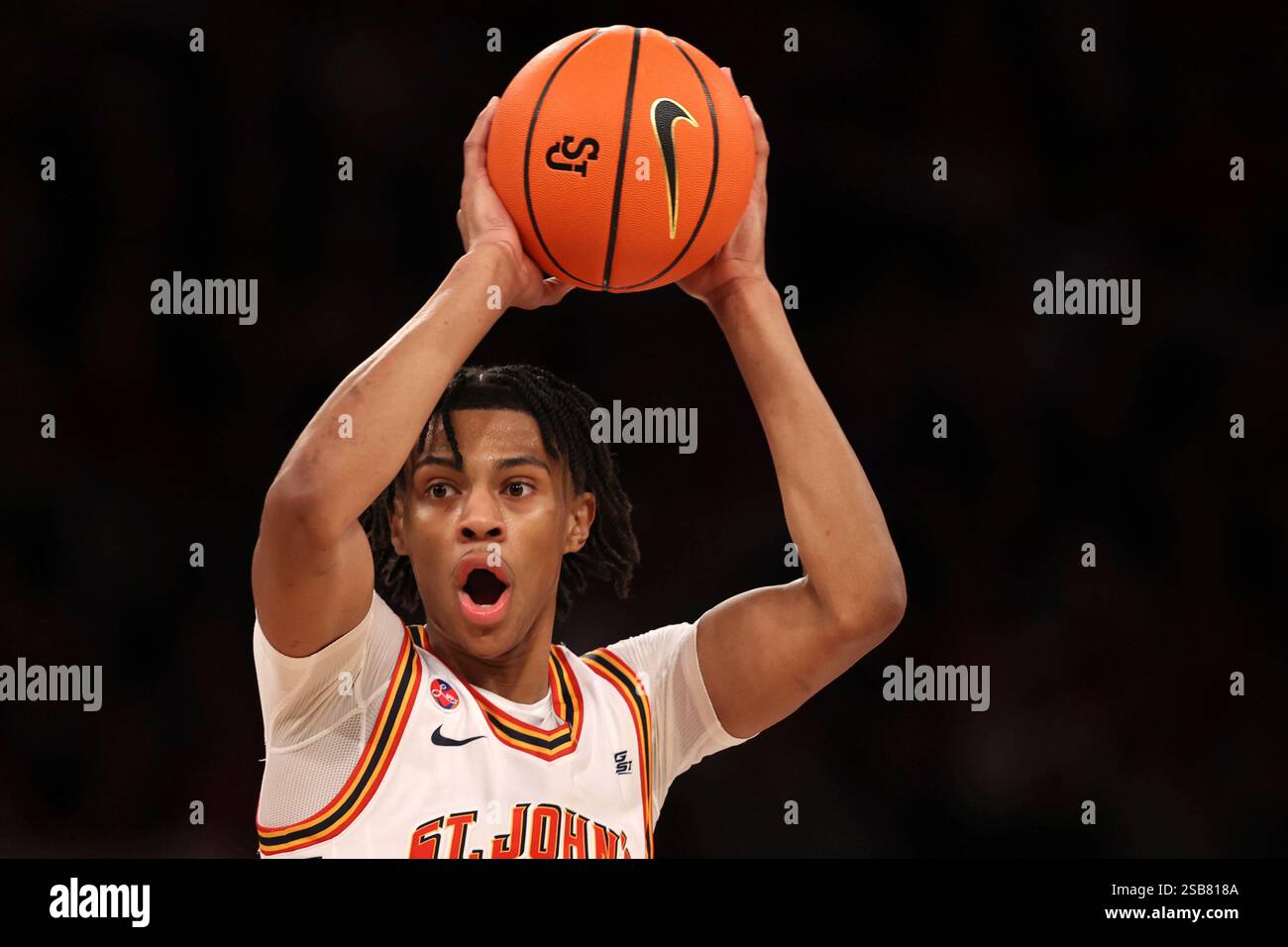 St. John's guard Simeon Wilcher (7) looks to pass the ball during the ...