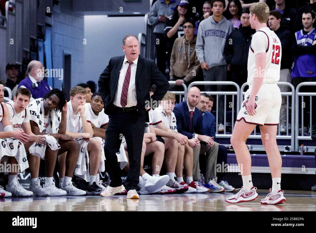 Wisconsin head coach Greg Gard, left, talks to forward Steven Crowl ...