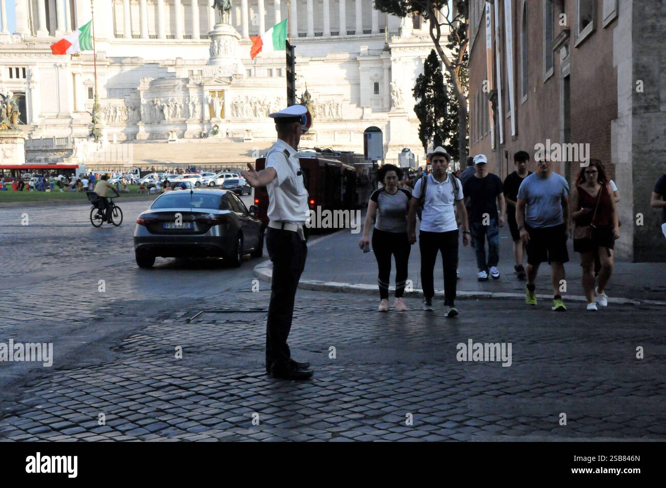 Rome / Italy 18.July 2019/ Police officer instructing traffic choas at ...