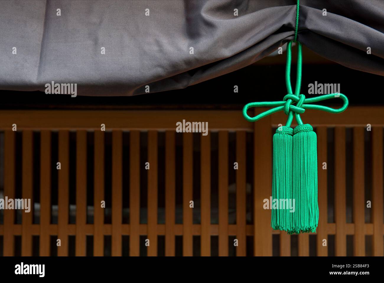 A traditional Japanese art form of knotting cords as decorations. Green ...