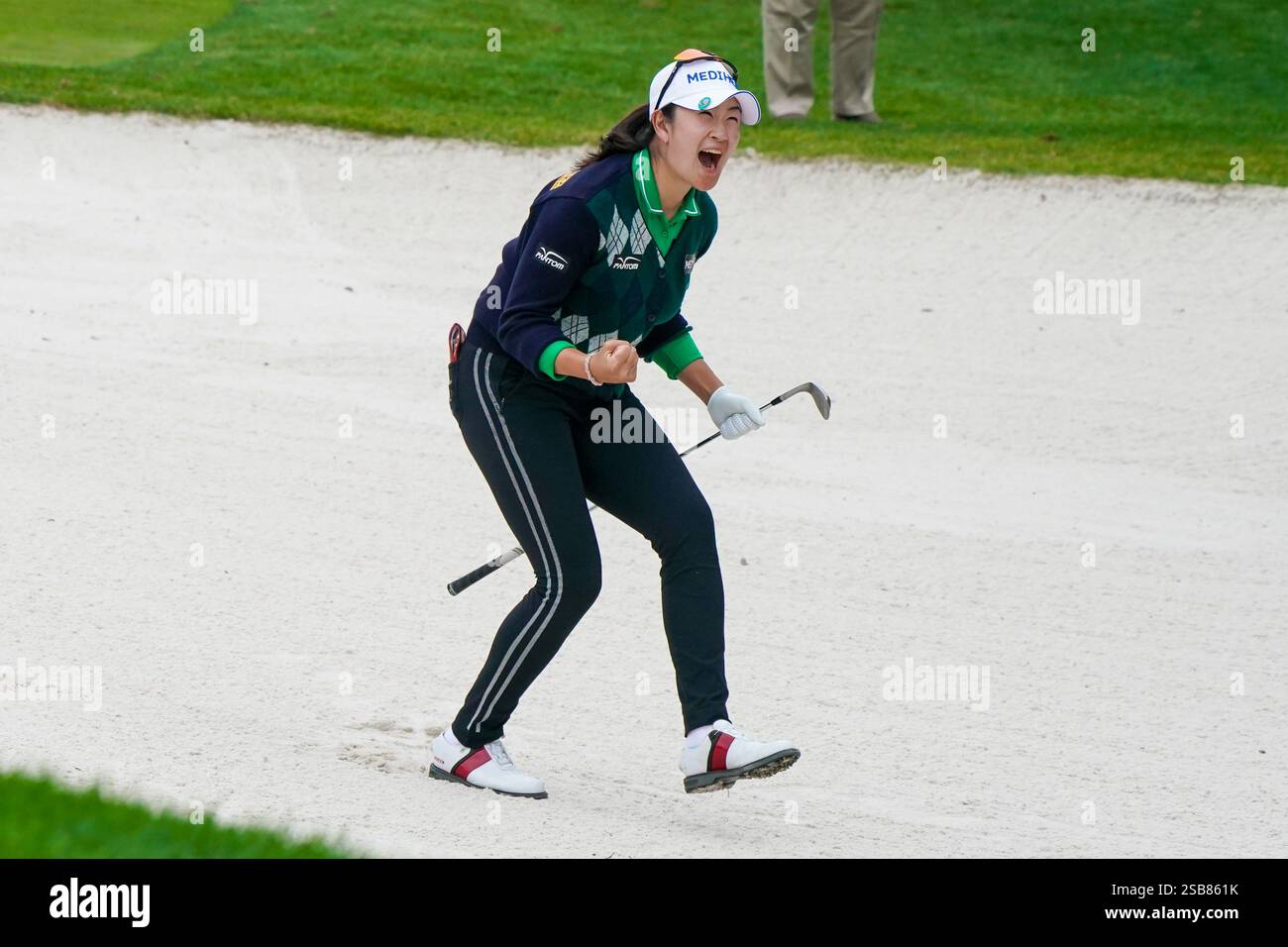 Orlando, Florida, USA. 1st Feb, 2025. A Lim Kim reacts after chipping ...