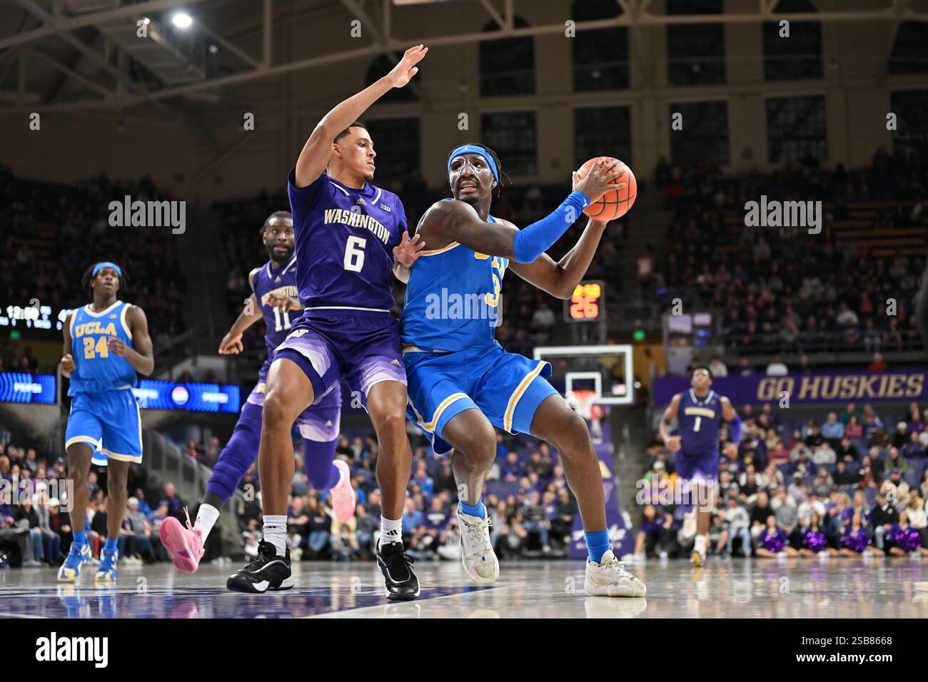January 24, 2025: UCLA Bruins guard Eric Dailey Jr. (3) works inside ...