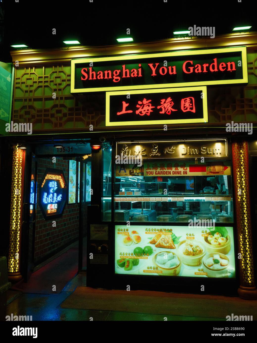 Shanghai You Garden restaurant sign at night in Flushing, Queens, New ...