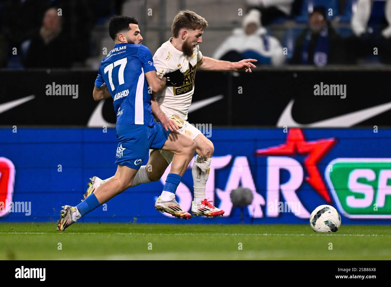 Genk, Belgium. 01st Feb, 2025. Genk's Zakaria El Ouahdi and Beerschot's ...