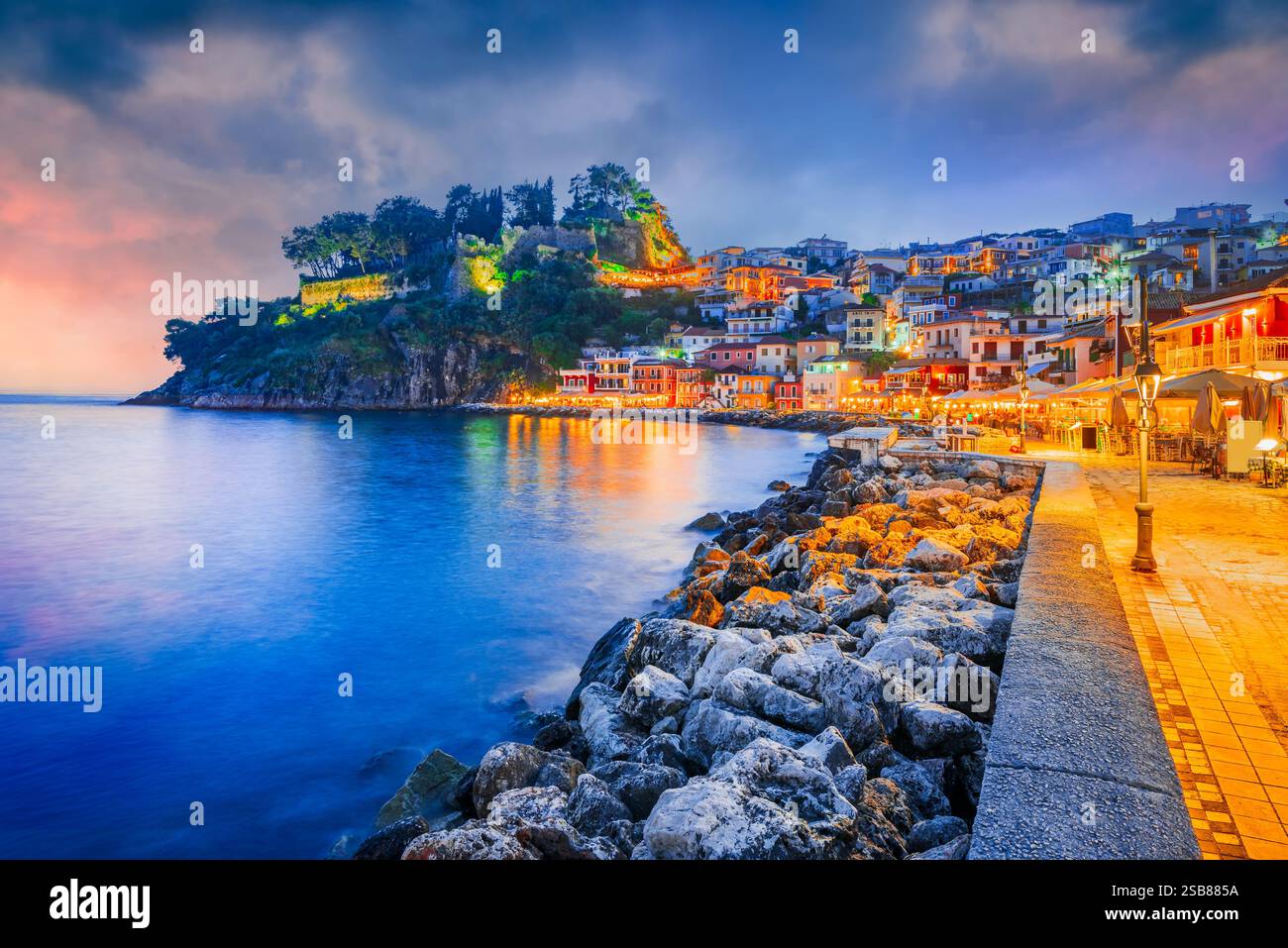 Parga at night, glowing waterfront old city, colorful houses ...