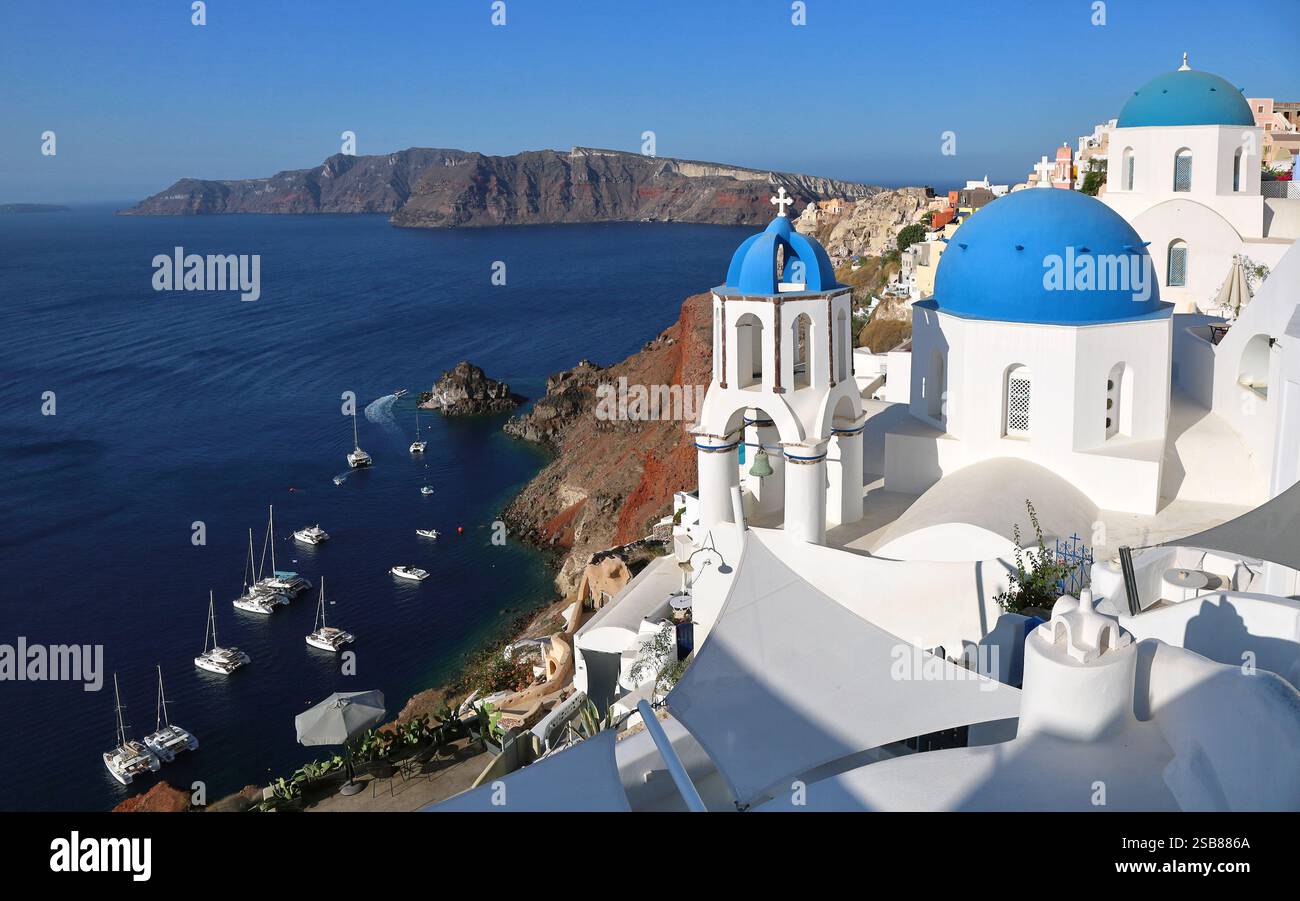 Oia Santorini's iconic blue-domed churches overlooking the island's ...