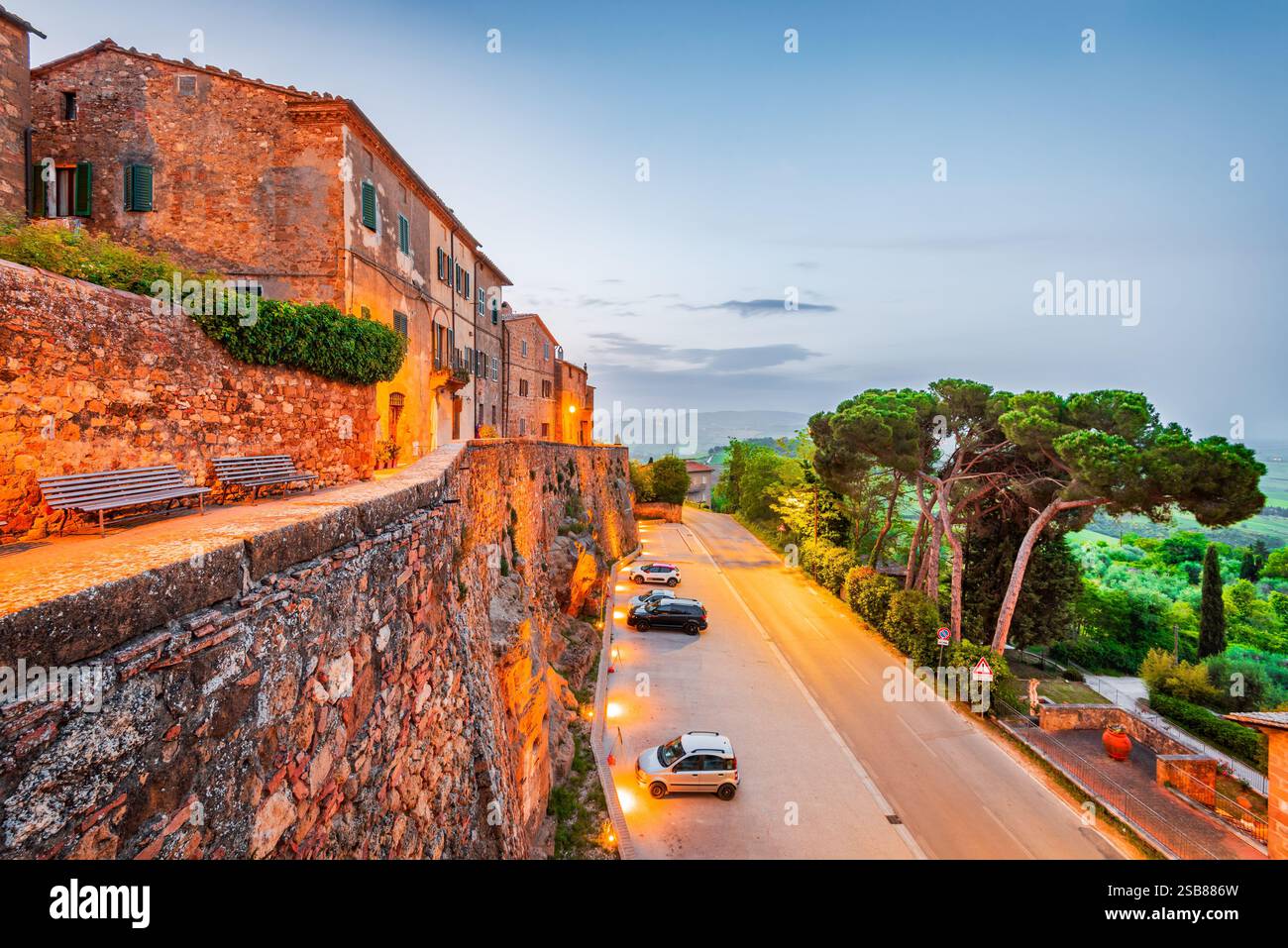 Pienza, Tuscany. Beautiful sunrise over Via del Casello, charming small ...