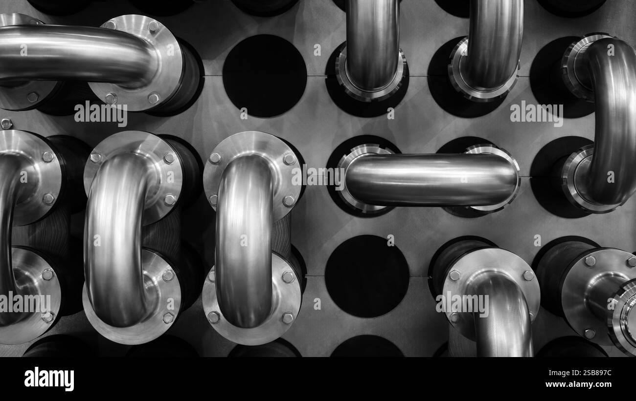 A close up of a group of metal pipes as industrial background. pipes ...