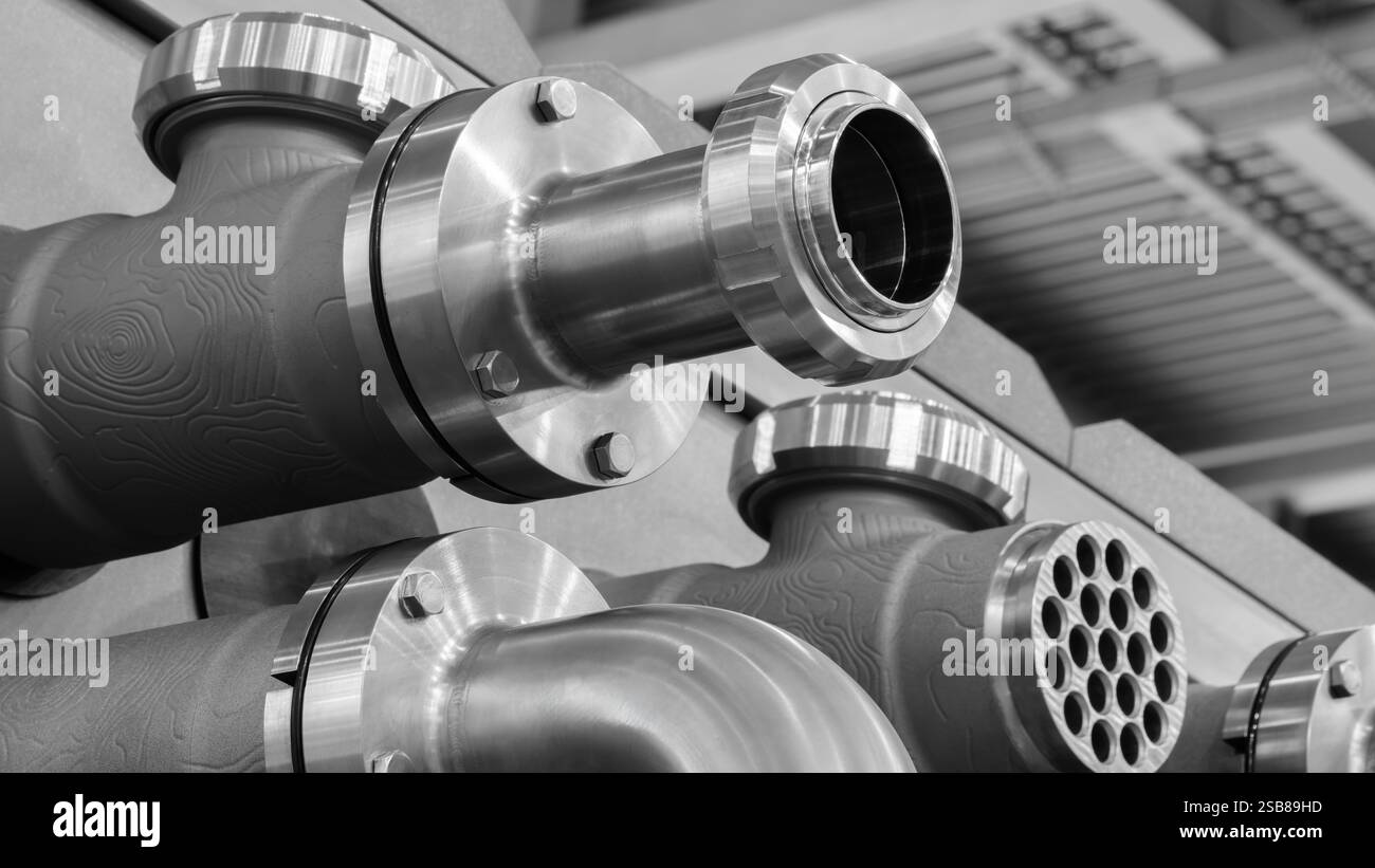 A close up of a group of metal pipes as industrial background. pipes ...