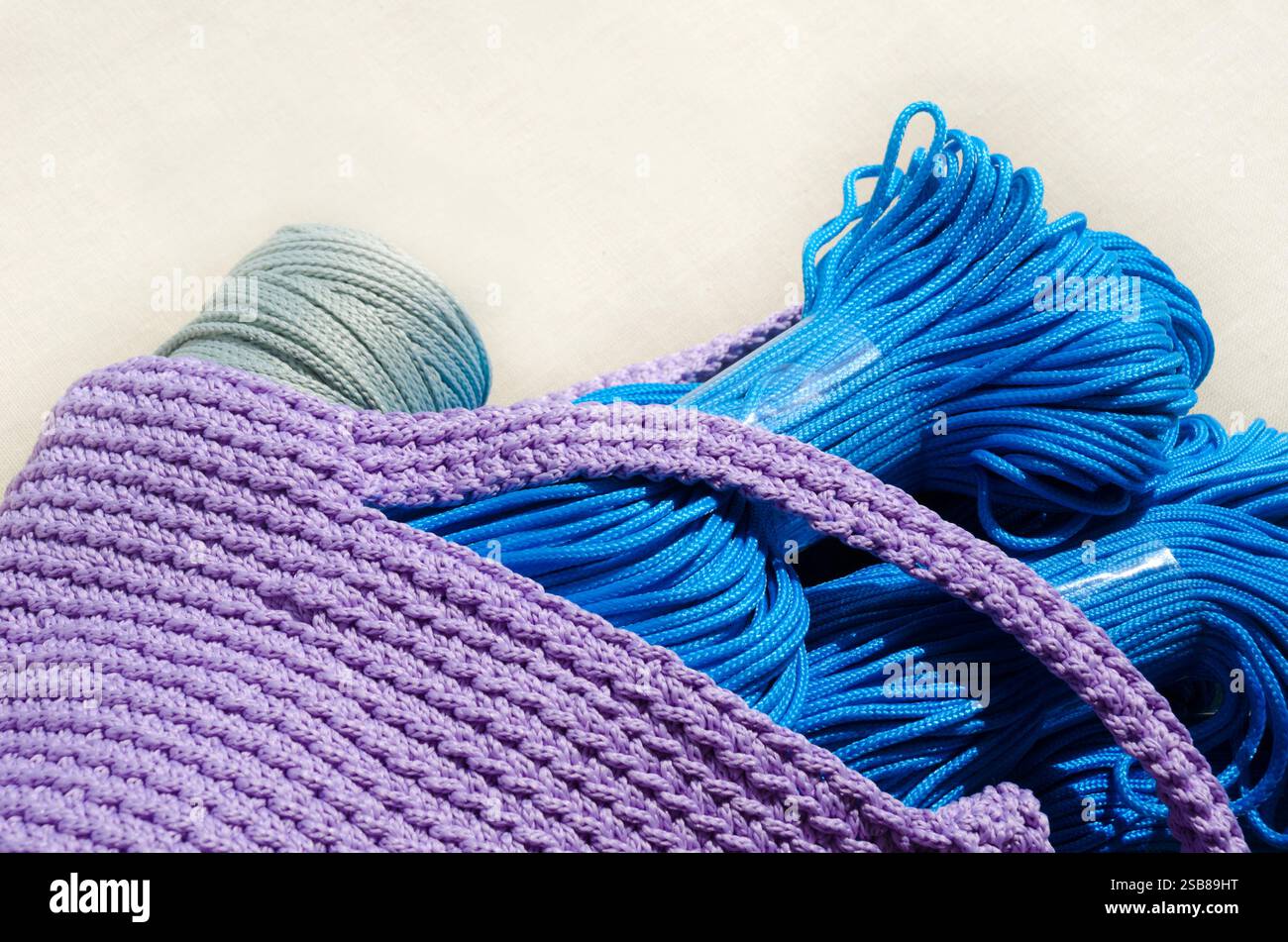 Crochet pattern using polyester cord. Bright blue cord for knitting ...