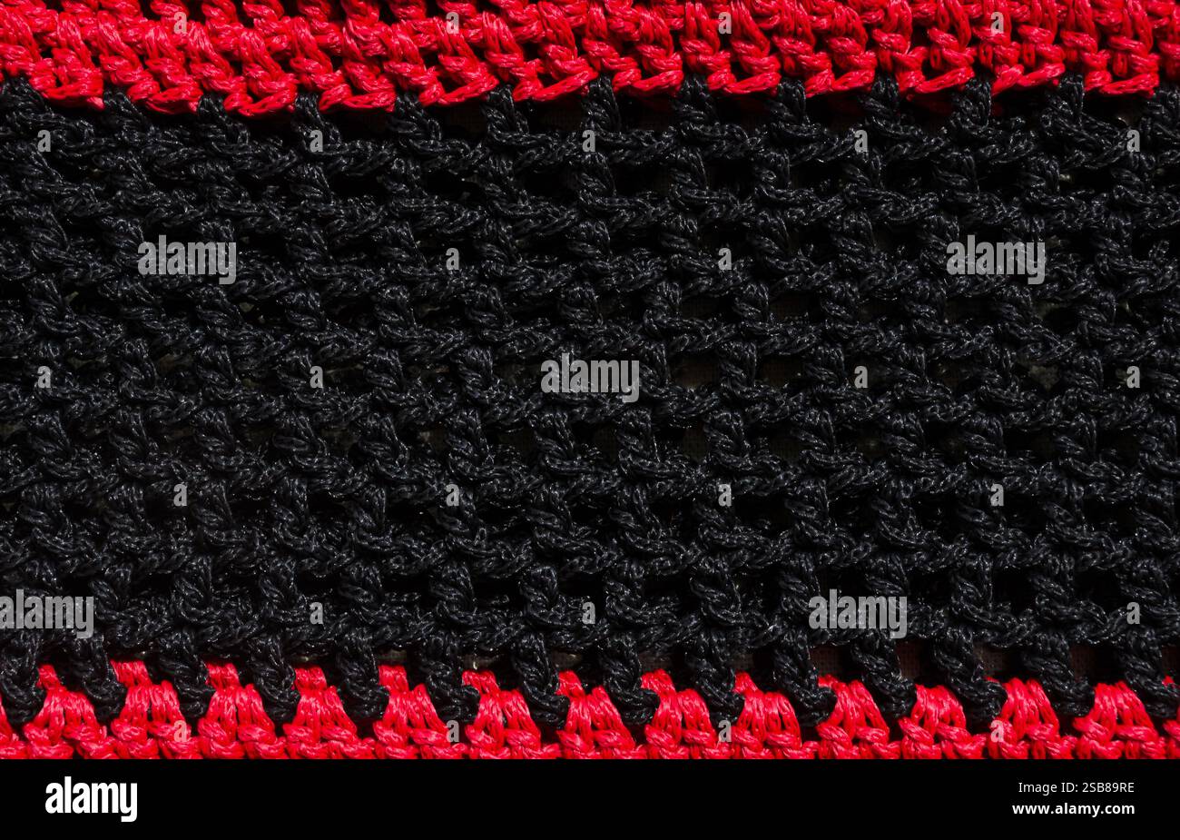 Crochet texture. Red and black polyester crocheted cords. Cord for ...