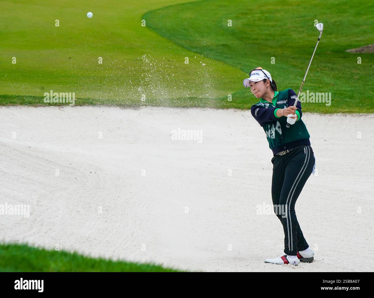 Orlando, Florida, USA. 1st Feb, 2025. A Lim Kim hits out of a greenside ...