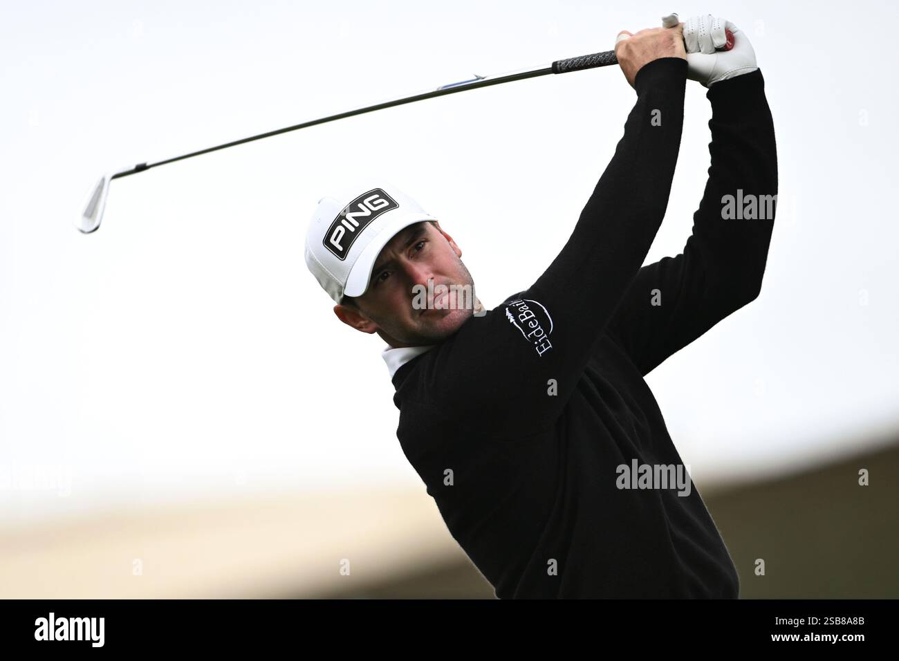 Austin Eckroat hits his tee shot on the first hole at Pebble Beach Golf ...