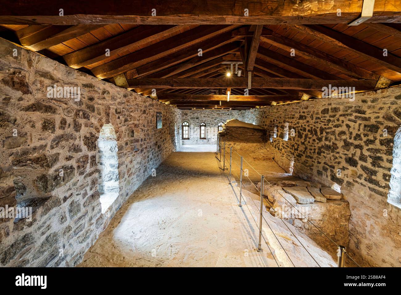 A historic stone room inside Andromonastiro Monastery in Messinia ...