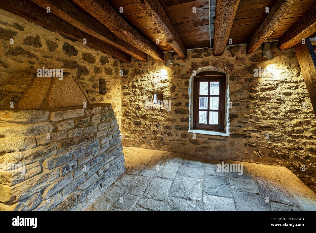 A historic stone room inside Andromonastiro Monastery in Messinia ...