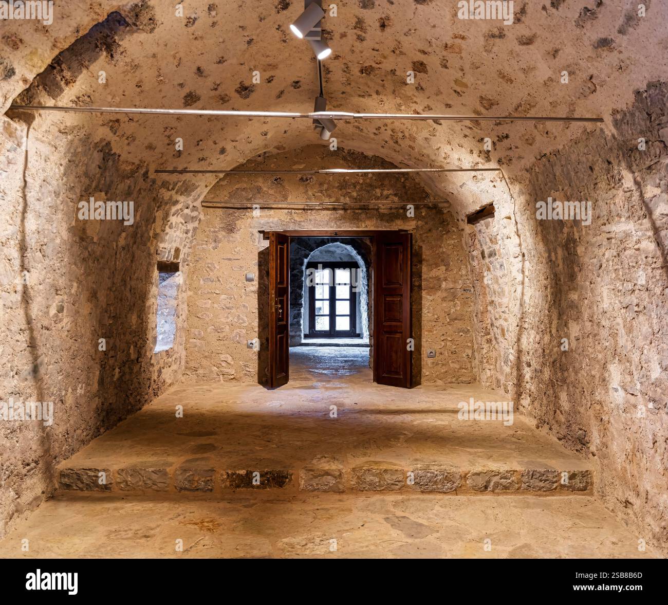 A small stone room inside Andromonastiro Monastery in Messinia, Greece ...
