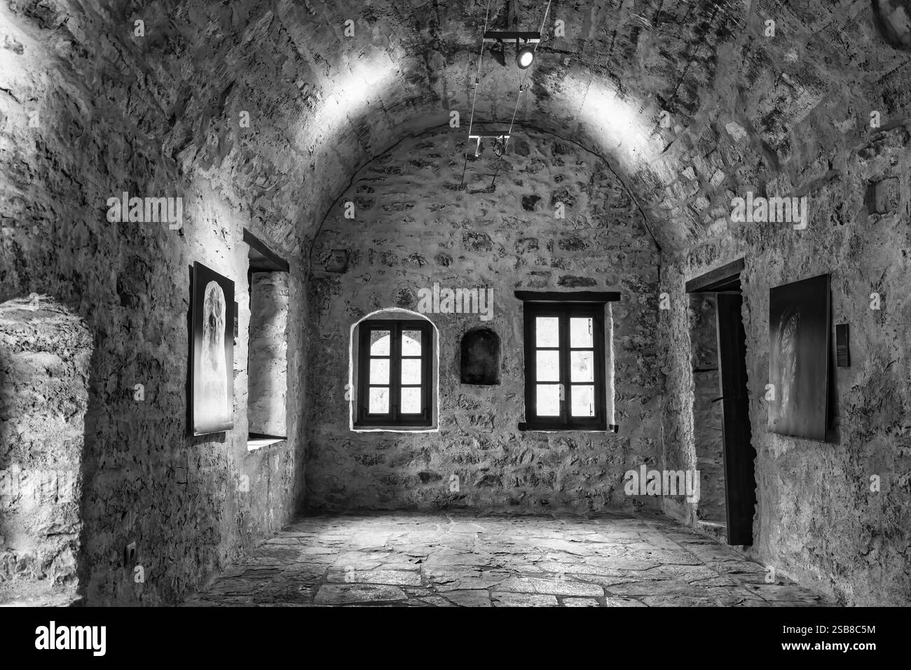 A small stone room inside Andromonastiro Monastery in Messinia, Greece ...