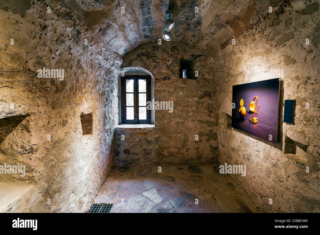 A small stone room inside Andromonastiro Monastery in Messinia, Greece ...
