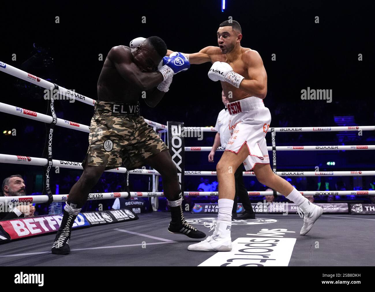 Callum Simpson (right) and Elvis Ahorgah in the Commonwealth Boxing ...