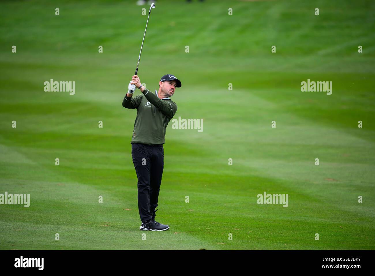 PEBBLE BEACH, CA - JANUARY 30: Brian Harman hits the ball off the ...
