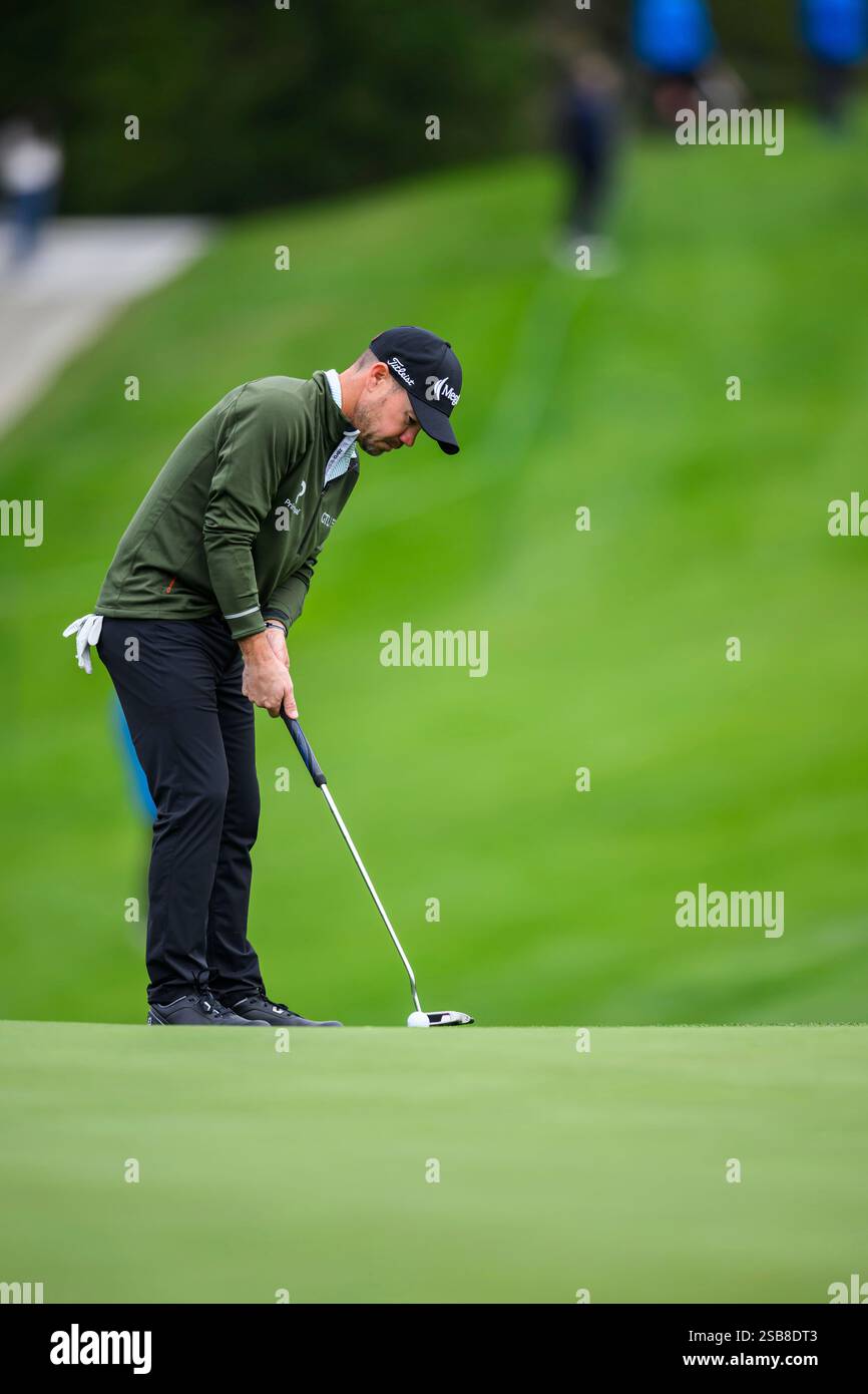 PEBBLE BEACH, CA - JANUARY 30: Brian Harman putts the ball on the 18th ...