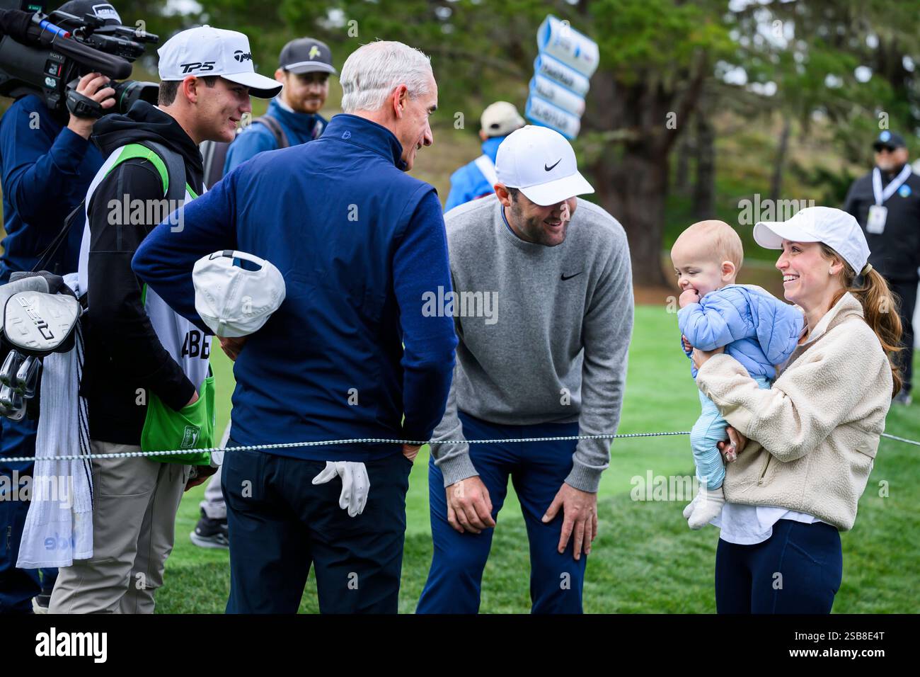 PEBBLE BEACH, CA - JANUARY 30: Scottie Scheffler introduces his wife and child too David Abeles ...