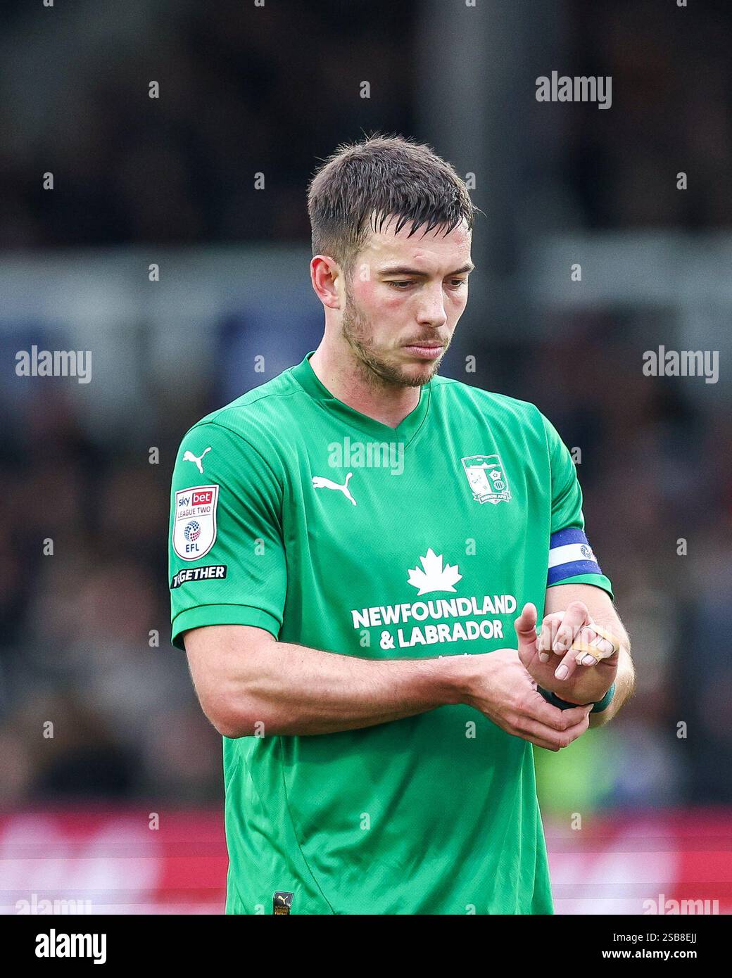 Newport, UK. 1st Feb 2025. #6, Niall Canavan of Barrow AFC during the ...