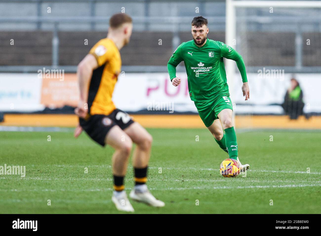 Newport, UK. 1st Feb 2025. #5, Kyle Cameron of Barrow AFC on the ball ...