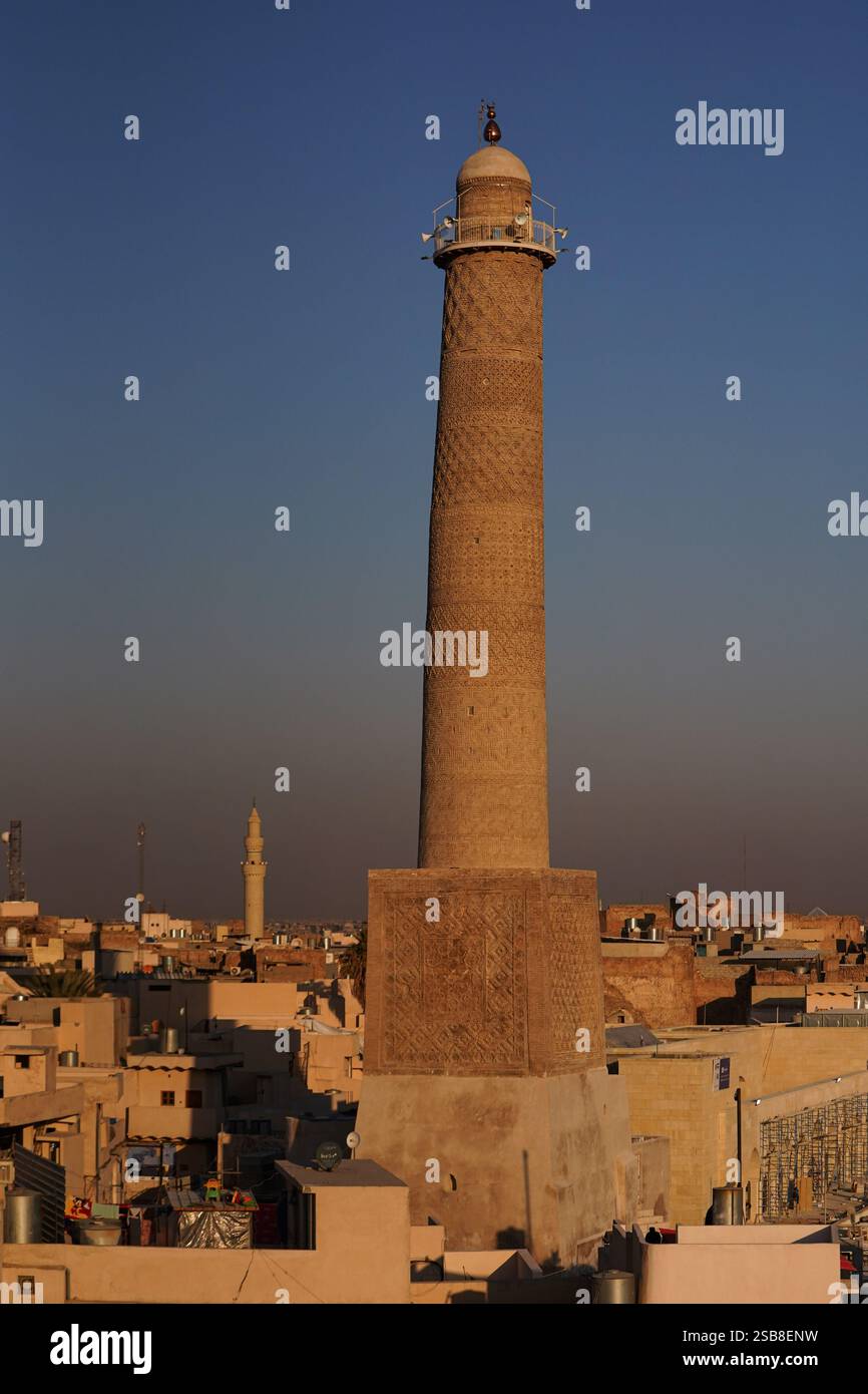 A view of the Al-Hadba minaret at the Great Mosque of al-Nuri, which ...