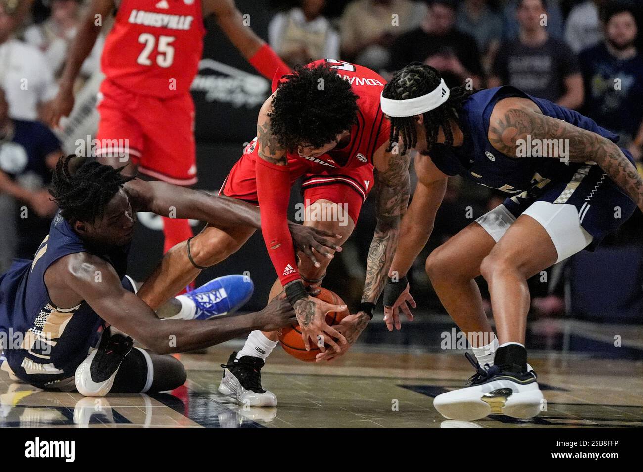 Louisville guard Terrence Edwards Jr. (5) and Georgia Tech guard Javian ...