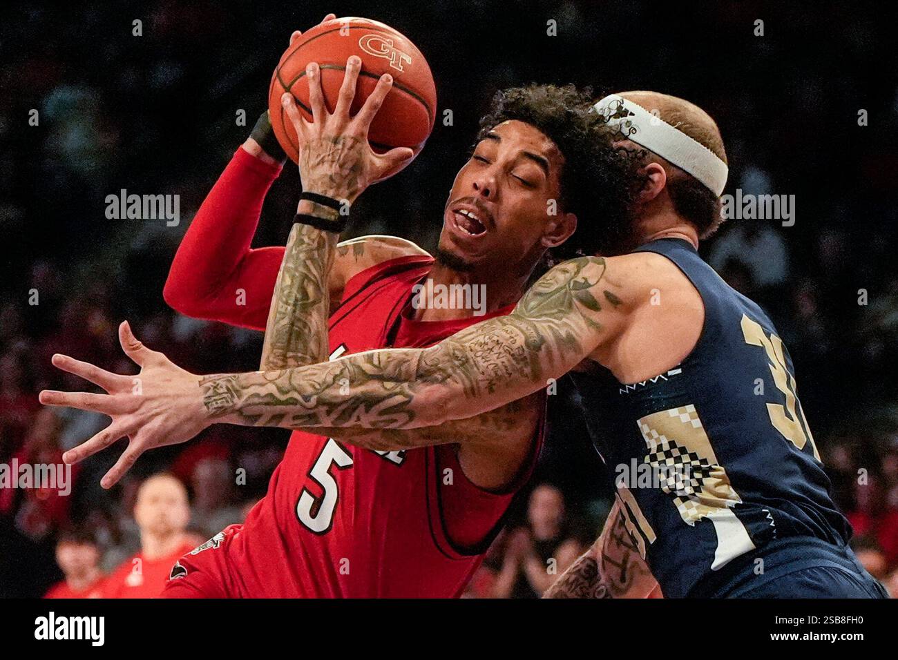 Louisville guard Terrence Edwards Jr. (5) drives against Georgia Tech ...