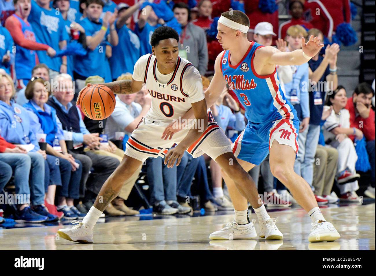 Auburn guard Tahaad Pettiford (0) is defended by Mississippi guard Sean ...