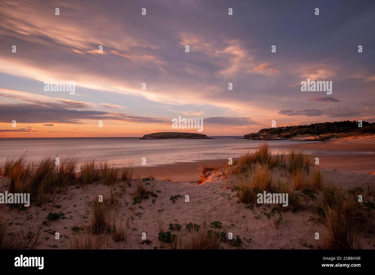Sunset on the beach of Loredo in the municipality of Somo in the ...
