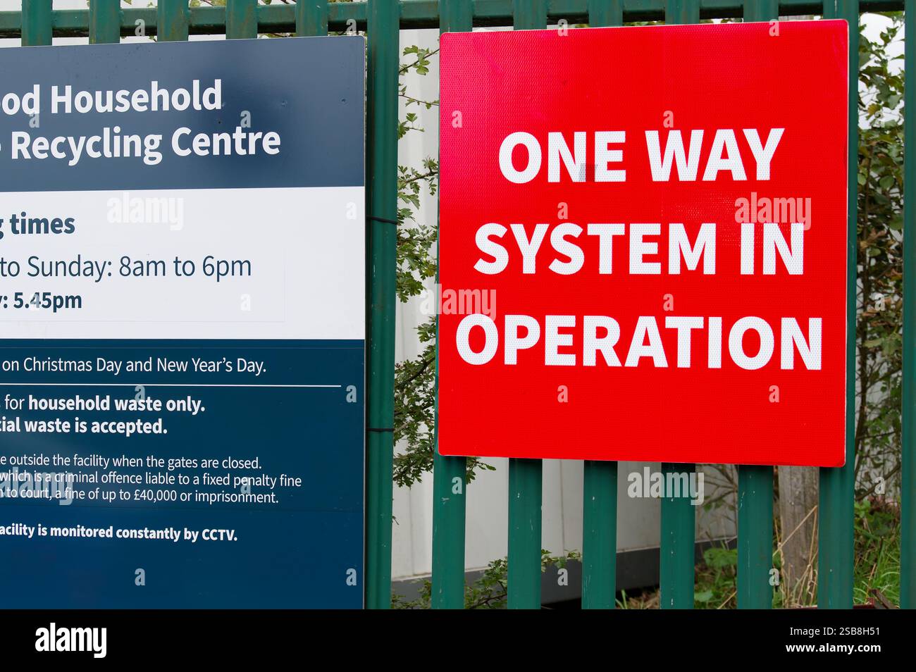 One way system in operation sign at construction site Stock Photo - Alamy