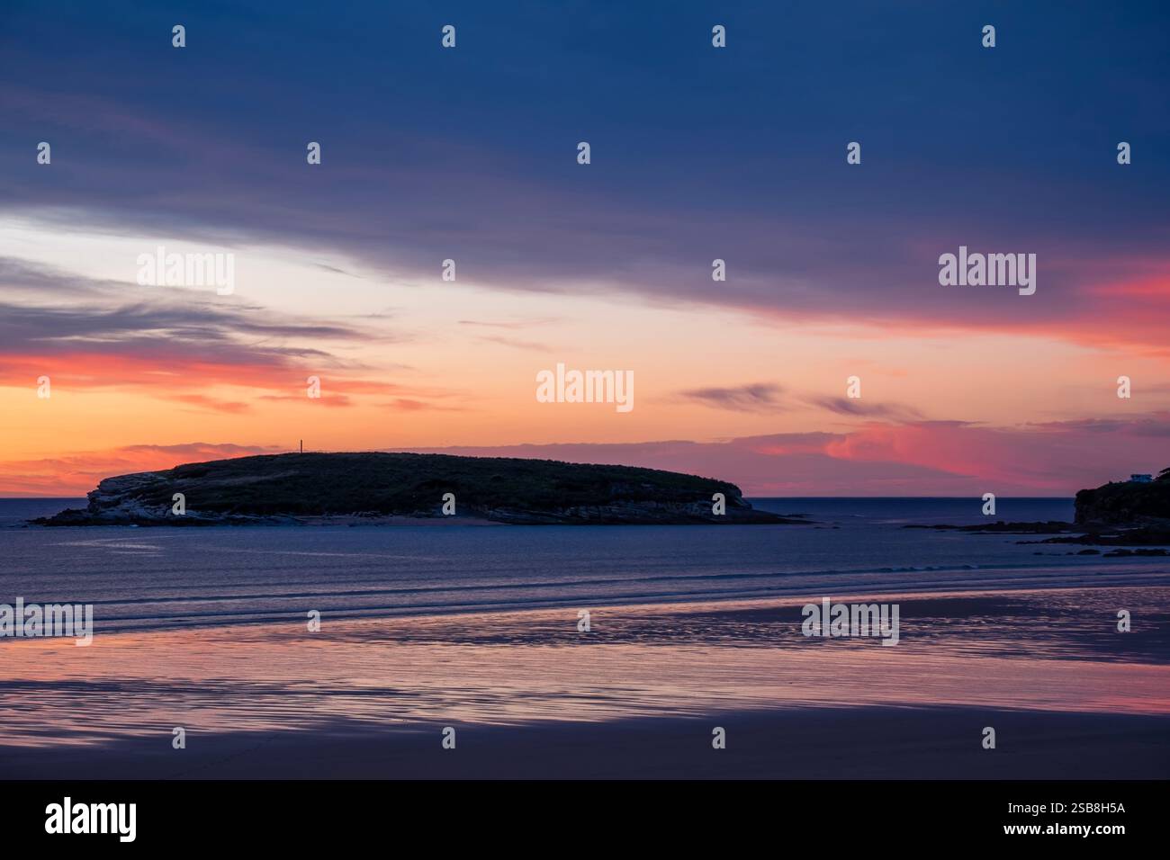 Sunset on the beach of Loredo in the municipality of Somo in the ...