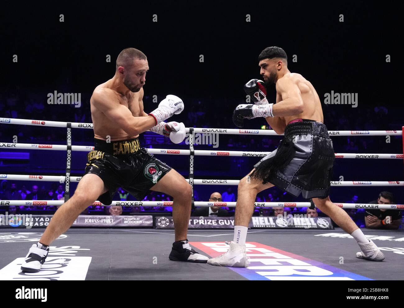 Adam Azim (right) and Sergey Lipinets in the IBO World Super Light ...