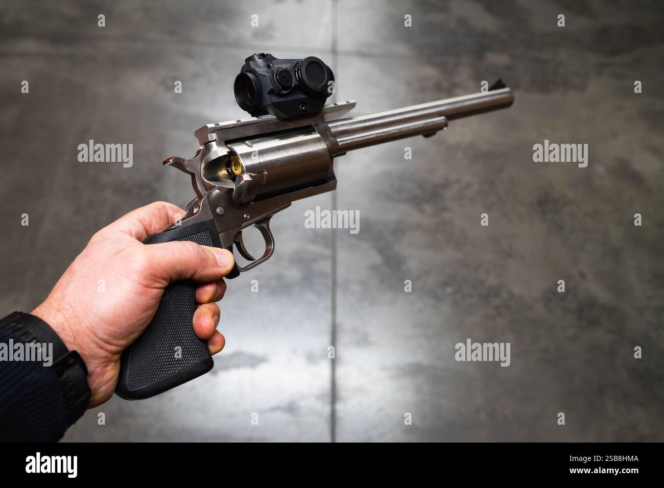 One of the most powerful Magnum revolvers with a red dot in the shooter ...
