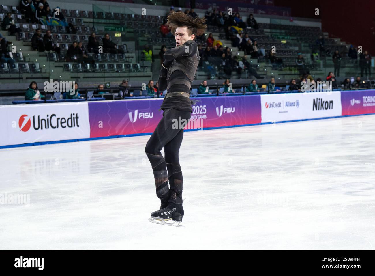 Mikhail Shaidorov of Kazakhstan in action during the Men Single Skating ...