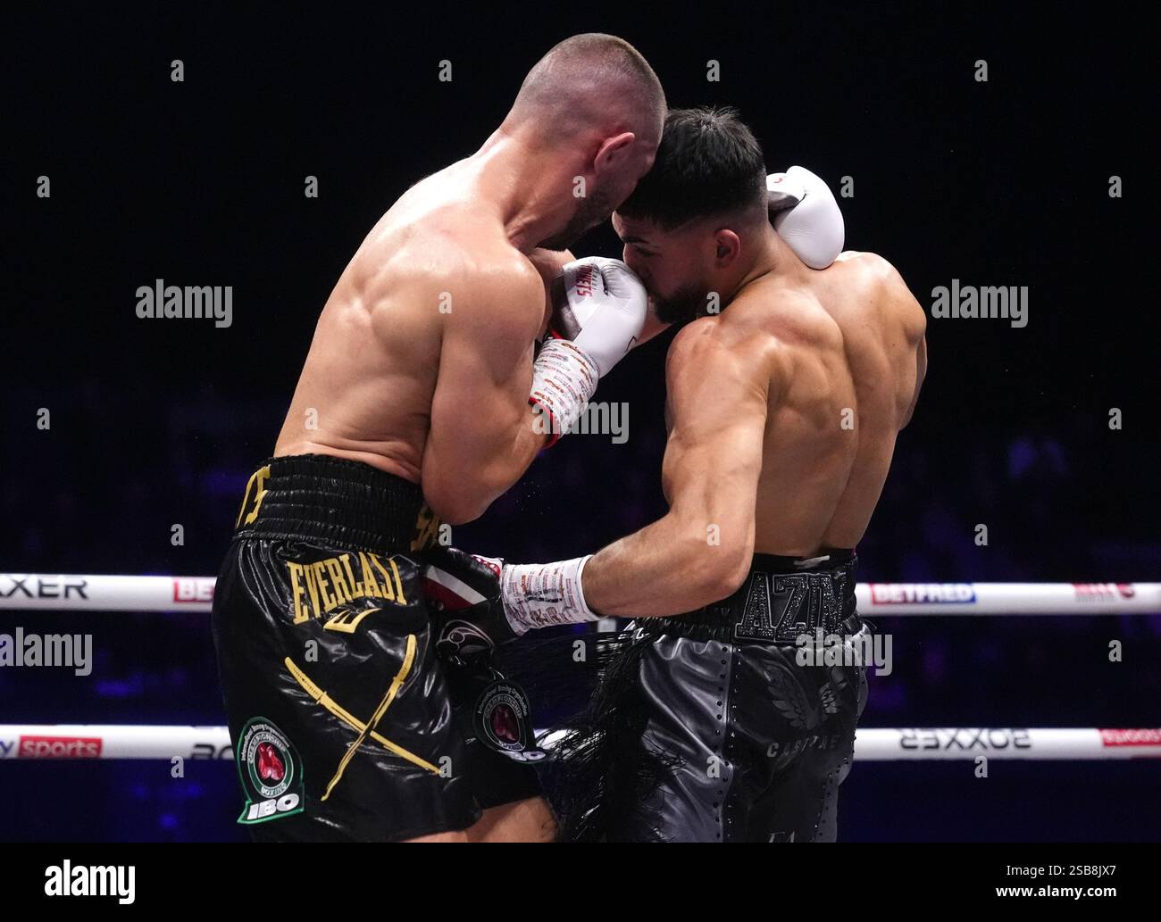 Adam Azim (right) deducted a point for a low blow against Sergey ...