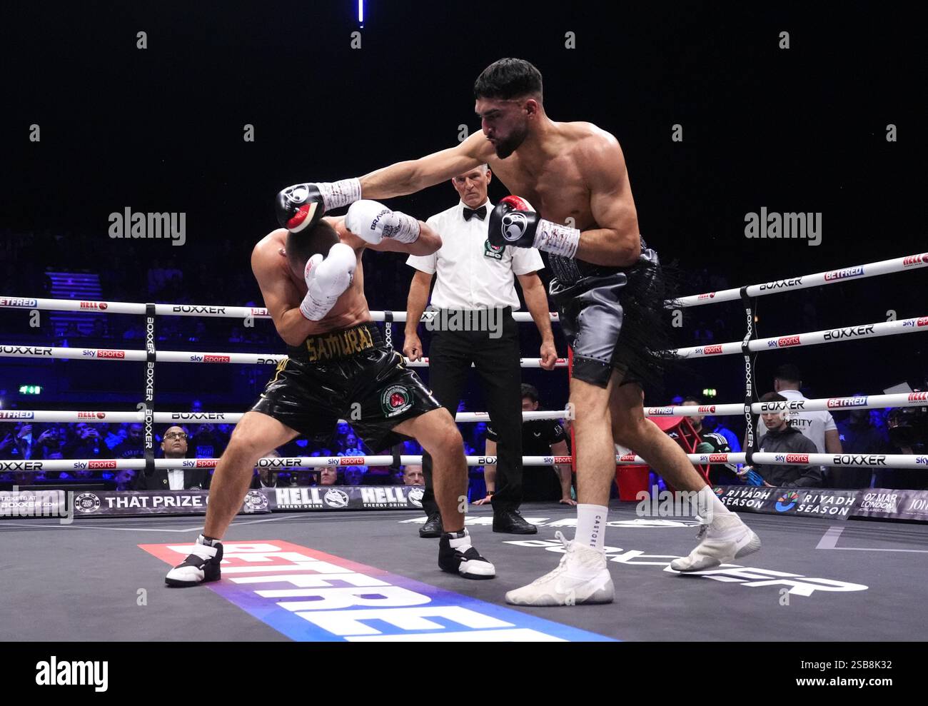 Adam Azim (right) and Sergey Lipinets in the IBO World Super Light ...