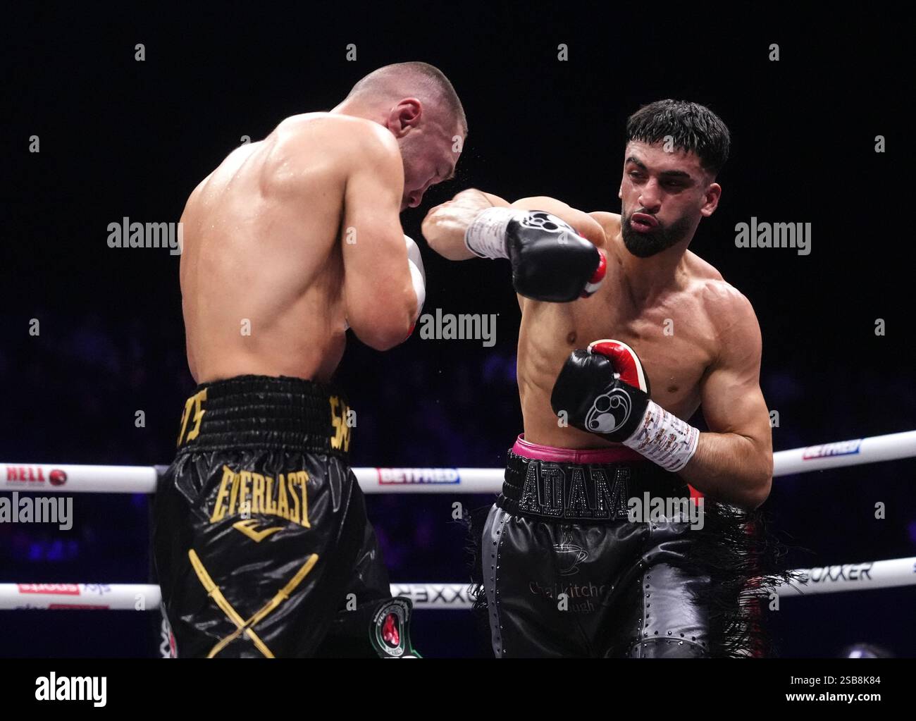 Adam Azim (right) and Sergey Lipinets in the IBO World Super Light ...