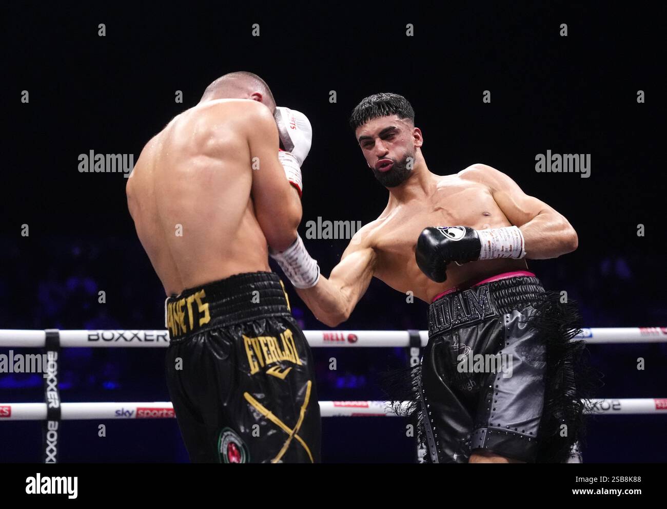 Adam Azim (right) and Sergey Lipinets in the IBO World Super Light ...