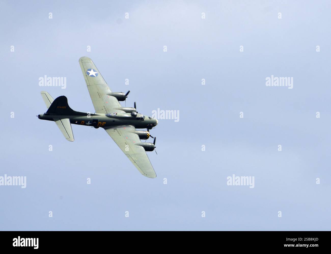 Vintage B-17 Flying Fortress G-BEDF Sally B in flight blue sky Stock ...