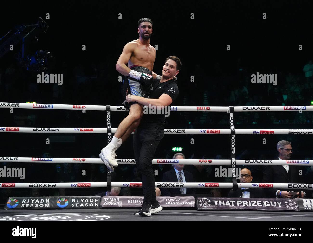 Adam Azim celebrates victory against Sergey Lipinets (not pictured ...
